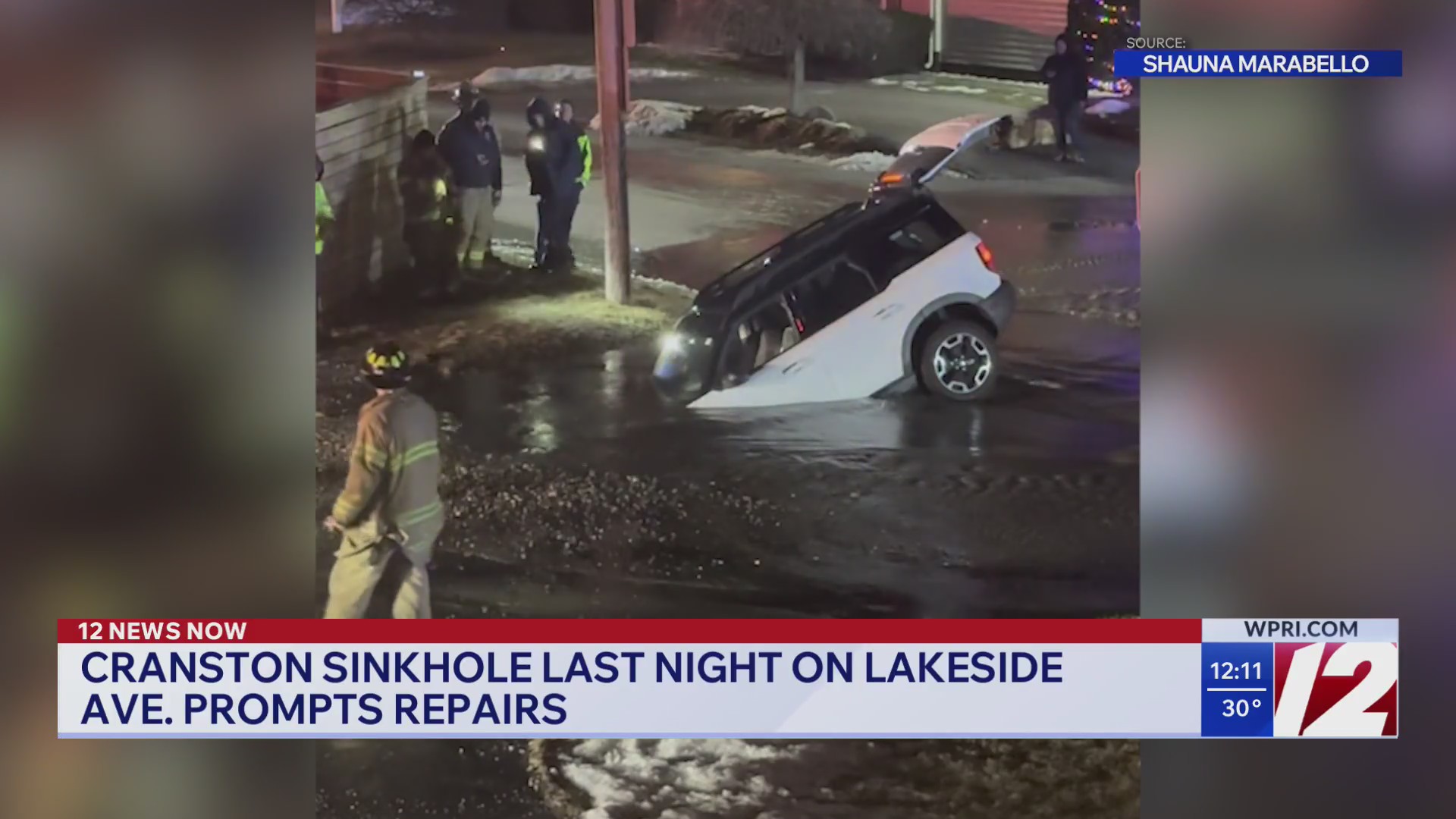 Car gets stuck in Cranston sinkhole
