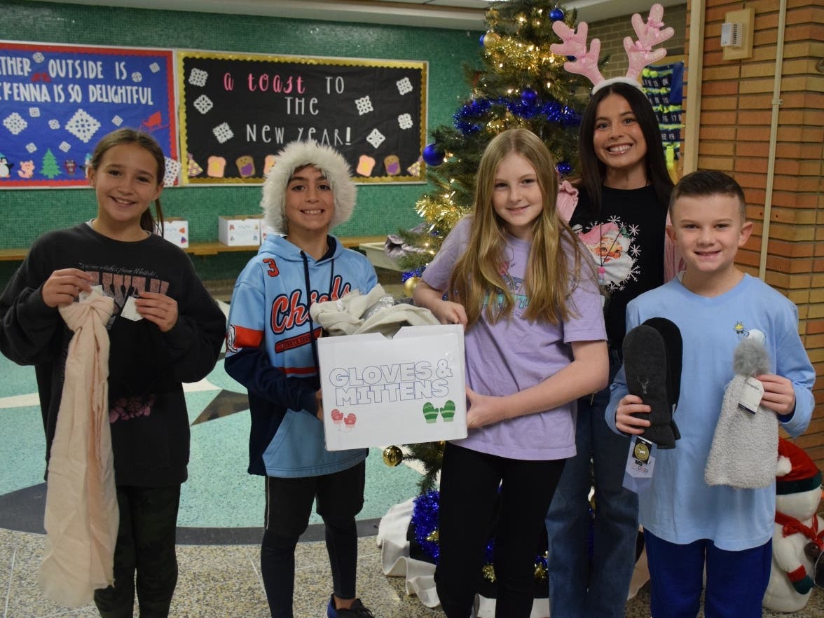 McKenna fifth graders donate winter clothes to parish outreach