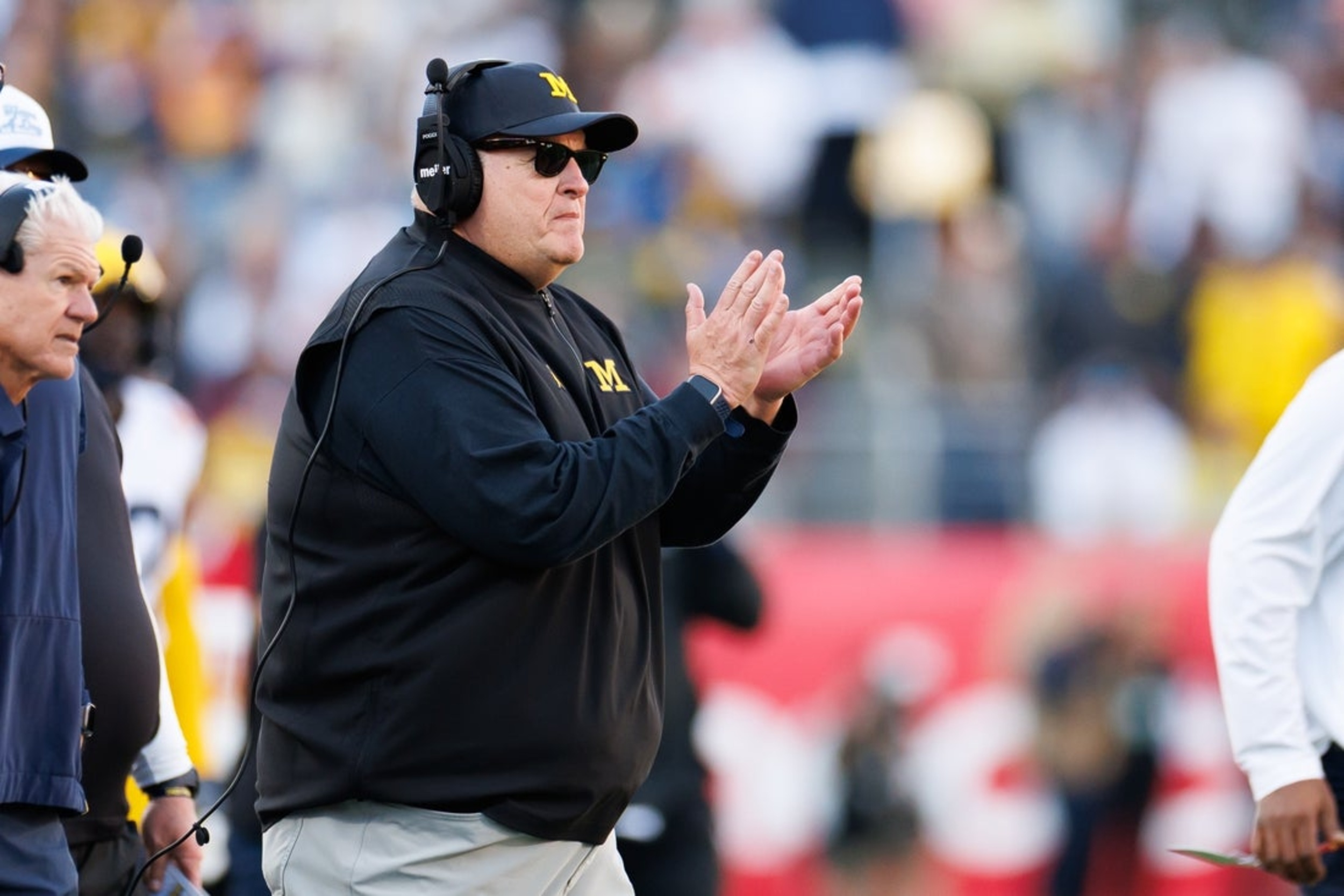 Interim coach Biff Poggi won't be back at Michigan