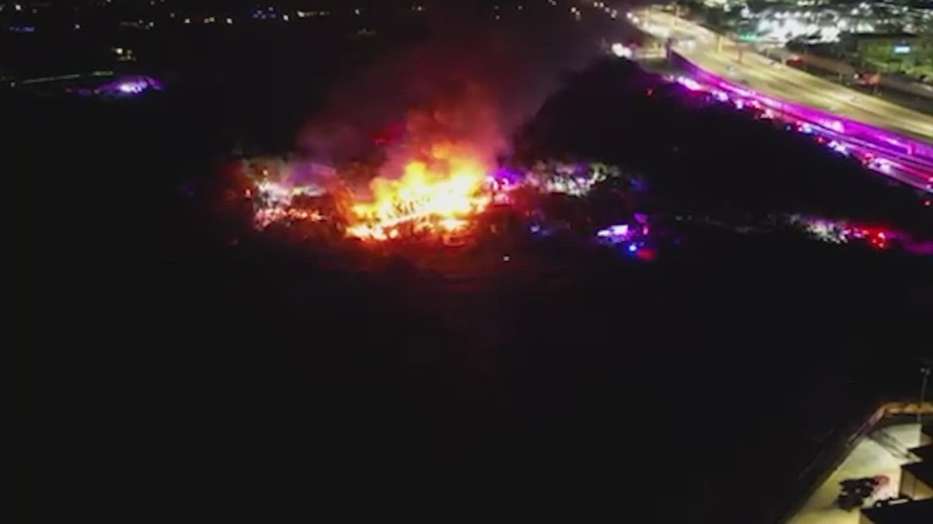 SAFD: Vacant buildings go up in flames after grass fire spreads off ...