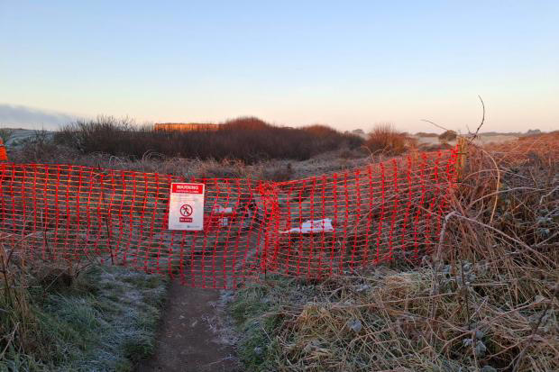 Cliff top path and parts of beach closed following substantial cliff fall