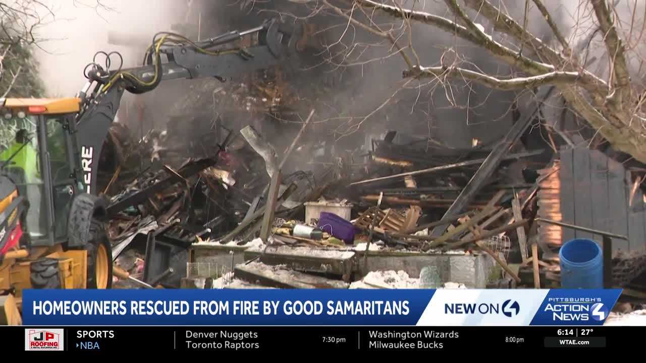 Bystanders rescue homeowners, crews forced to use backhoe to destroy ...
