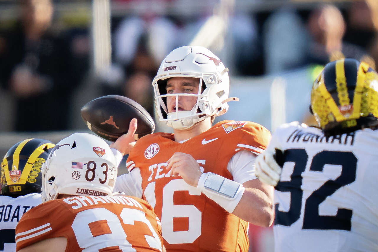 Arch Manning's big game helps No. 13 Texas rally past No. 18 Michigan ...