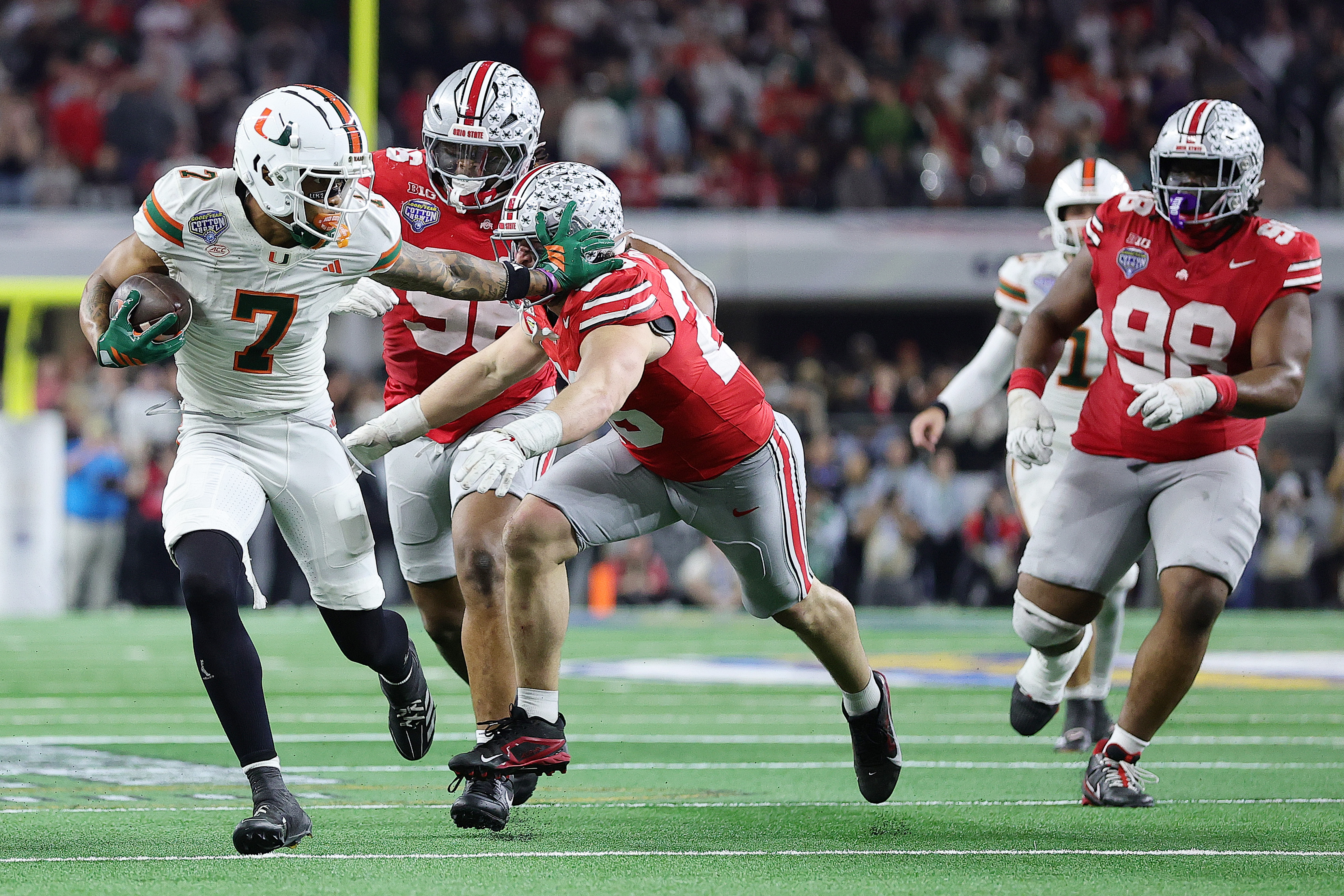 Miami beats defending national champ Ohio State 24-14 in CFP quarterfinal