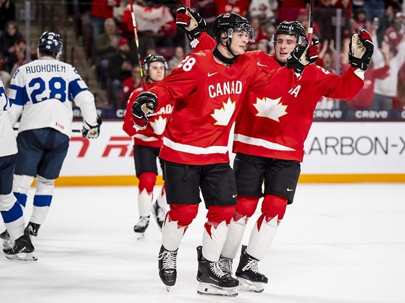 Canada outlasts Finns after early goal-fest to secure first place in ...