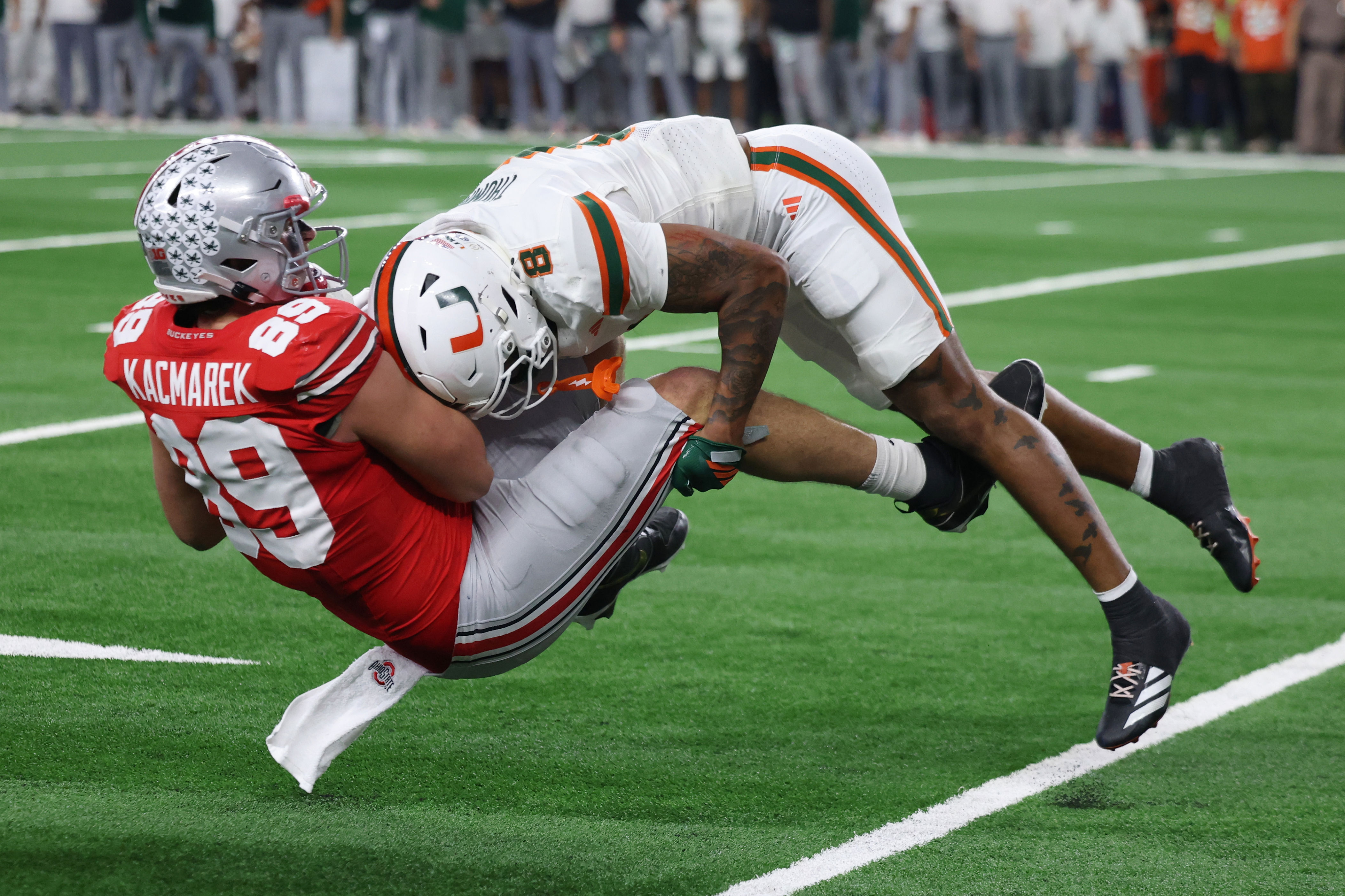 Miami beats defending national champ Ohio State 24-14 in the CFP ...
