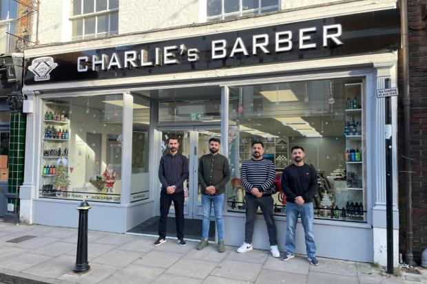 Charlie's mini-empire expands by opening barbershop on Catherine Street