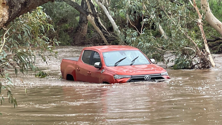 Father and daughter walk 13km after escape from flooded car in outback ...