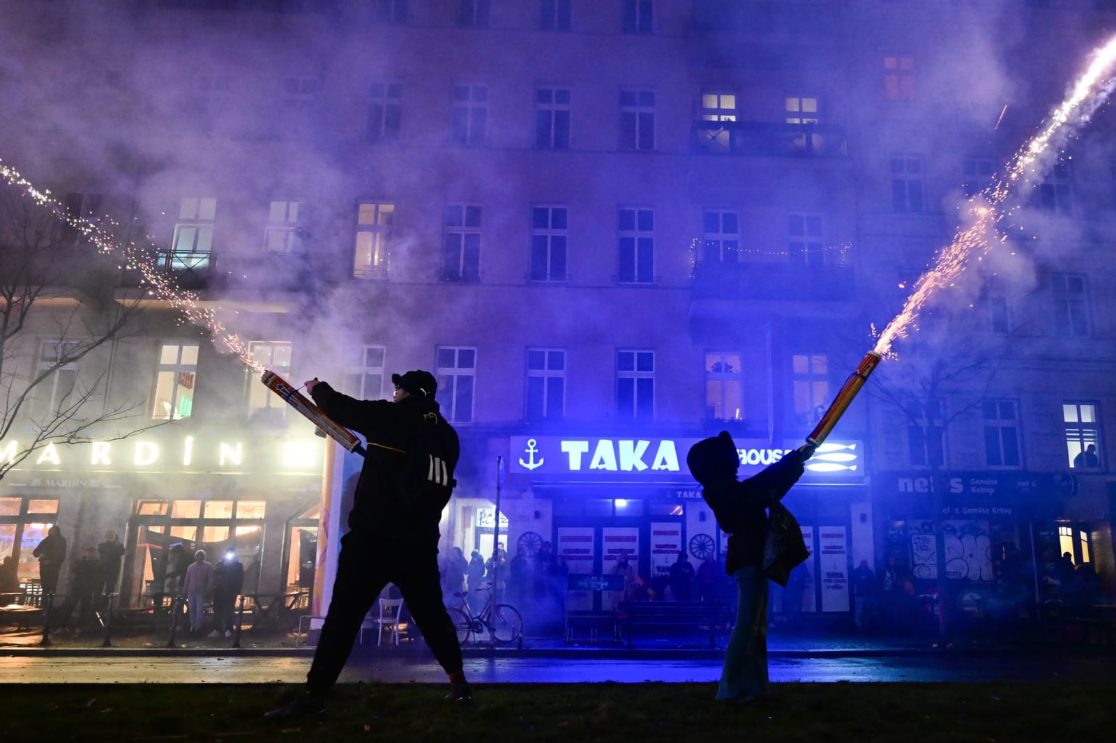 Attacks on police and arrests in Germany as nation rings in 2026