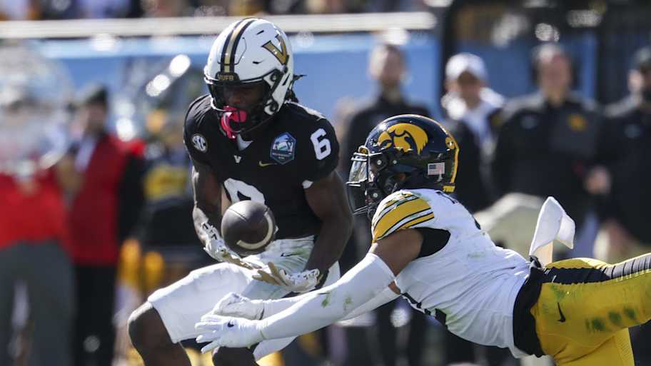 Iowa finally tastes victory over ranked opponent