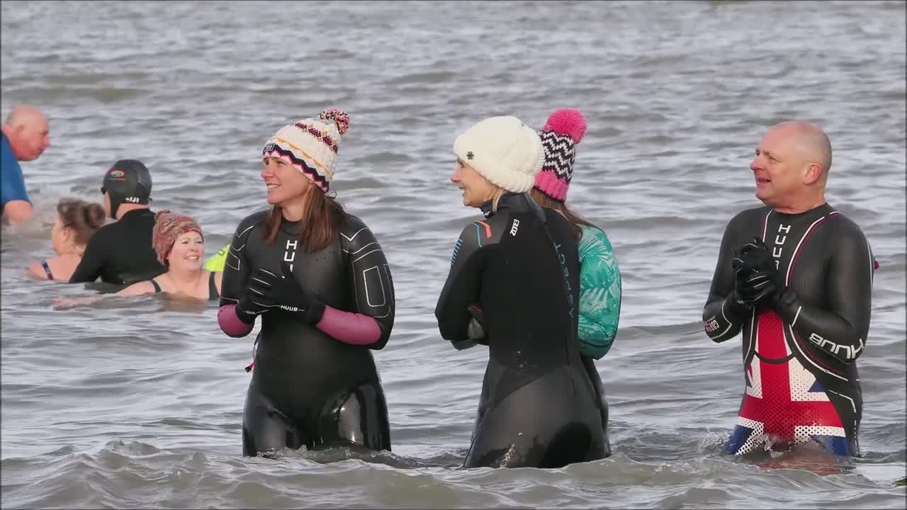 Swimmers brave cold conditions for New Year's Day swim off Kent, UK