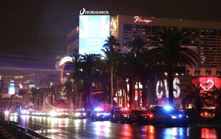 A rare scene: New Year’s party on Strip gets wet, chilly as more ...