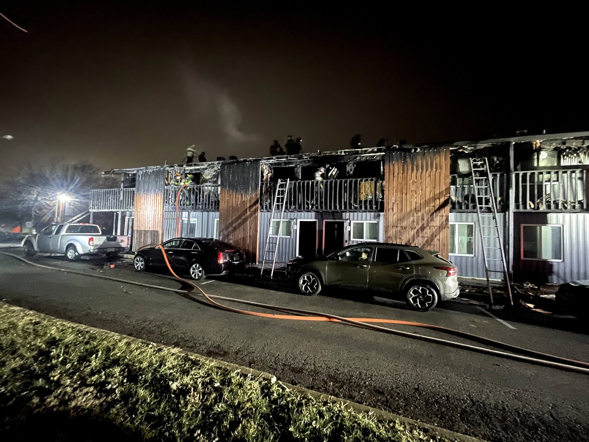 Half of 16-unit apartment building damaged by fire, 18 residents displaced