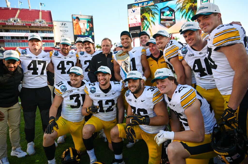 Photo gallery: Iowa football celebrates a ReliaQuest Bowl win