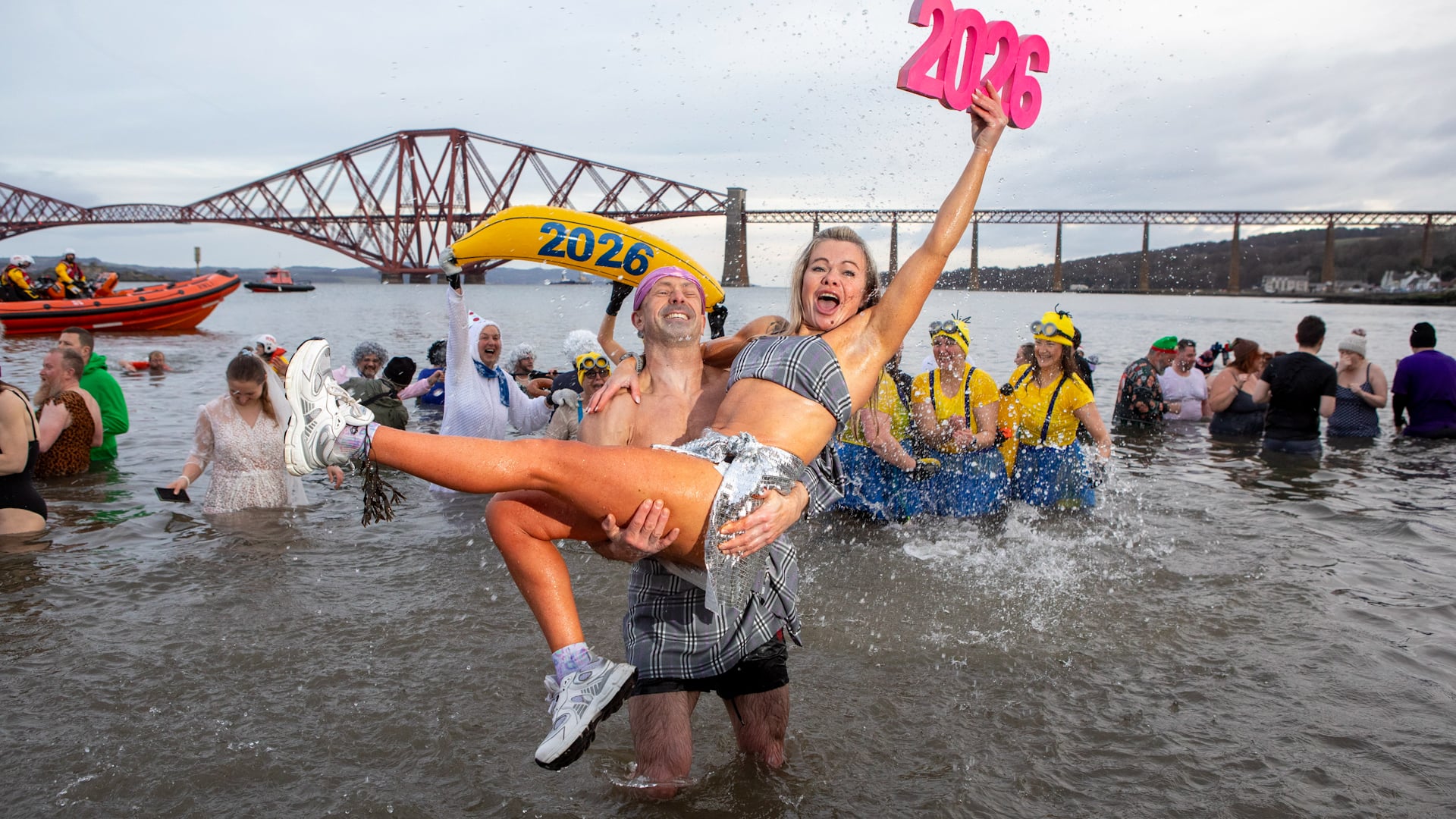 People brave the cold conditions for New Years Day dip near Edinburgh