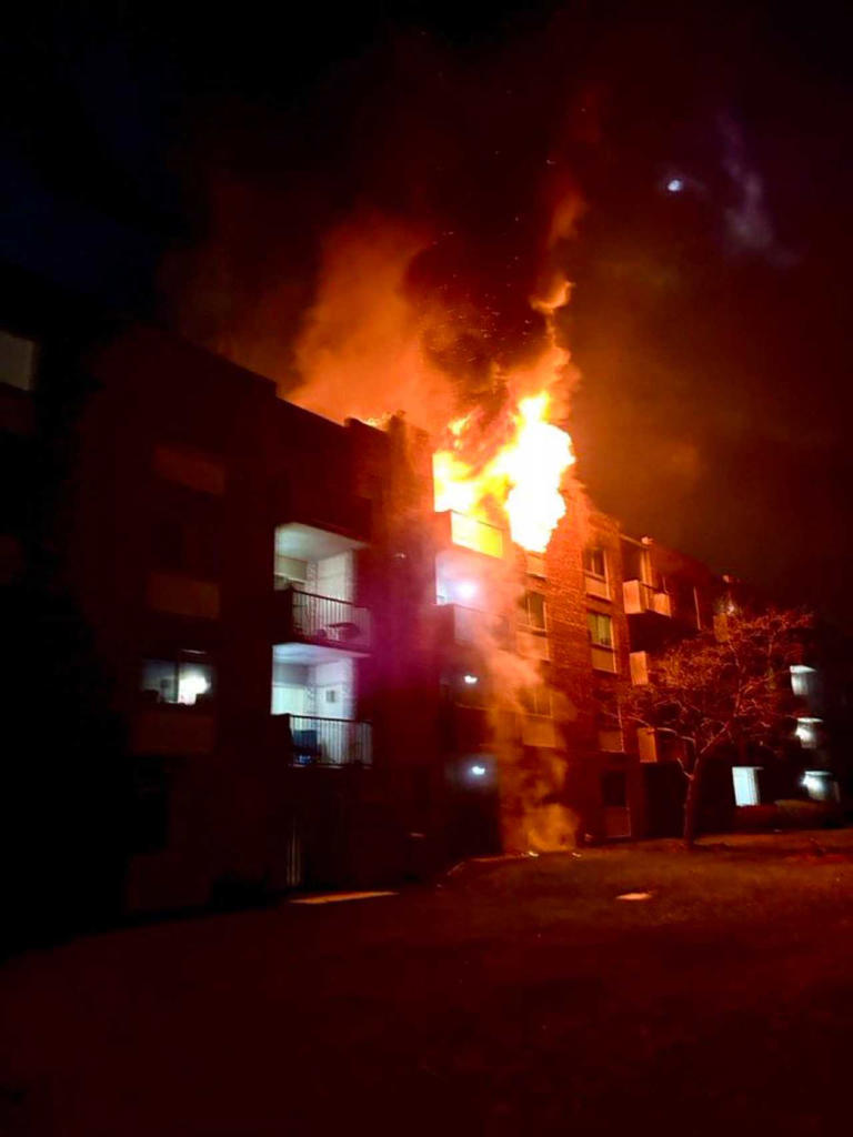 Child hospitalized after two-alarm apartment fire traps residents in ...