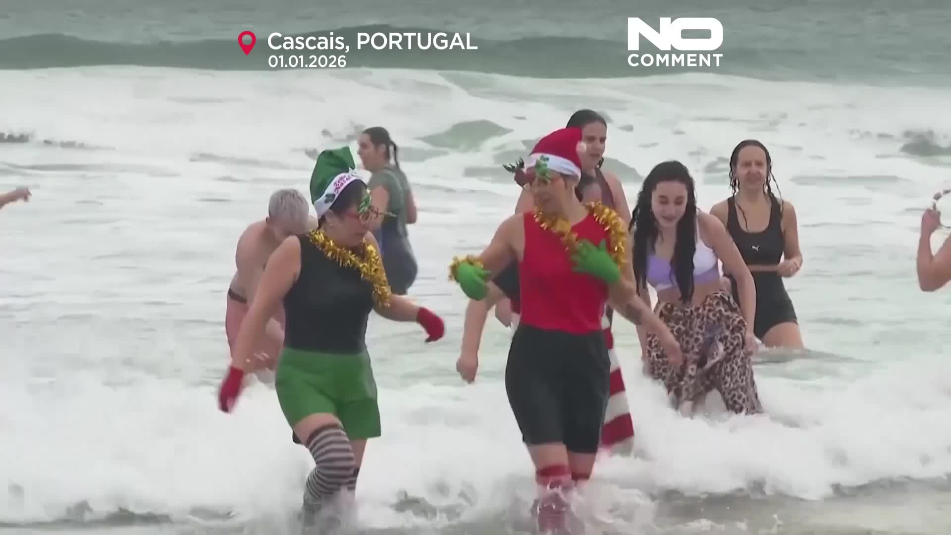 Swimmers brave traditional New Year’s sea dip at Carcavelos Beach near ...