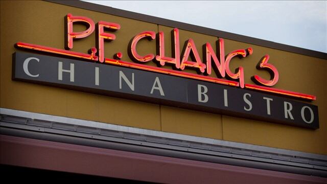 Driver injured, arrested after car catches fire hitting PF Chang’s sign
