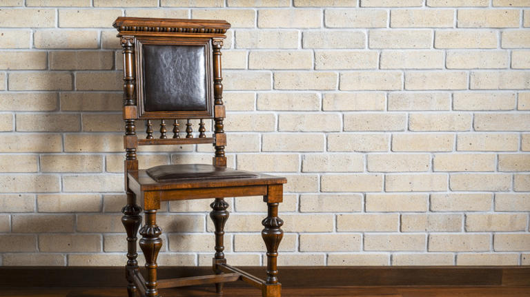 Reuse an antique wooden chair for an adorable bedroom furniture solution