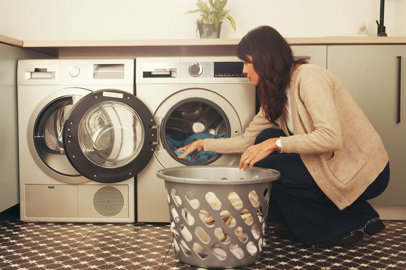 Stunned woman opened washing machine to find she'd brought more than ...