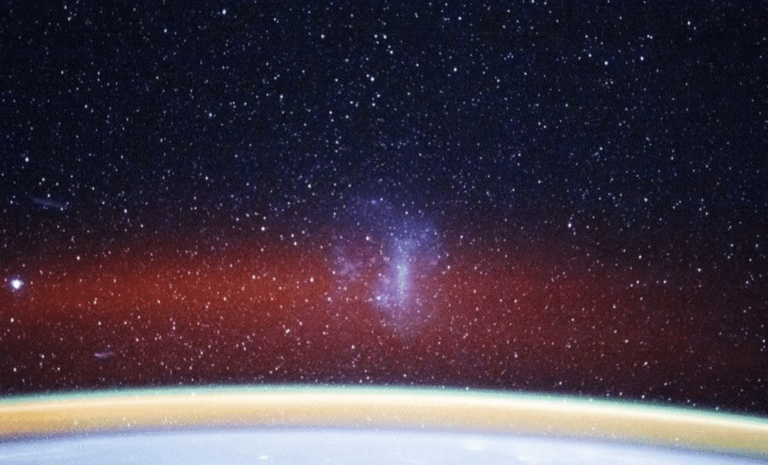 Astronauts snap rare glimpse of galaxy bursting with stars just outside ...