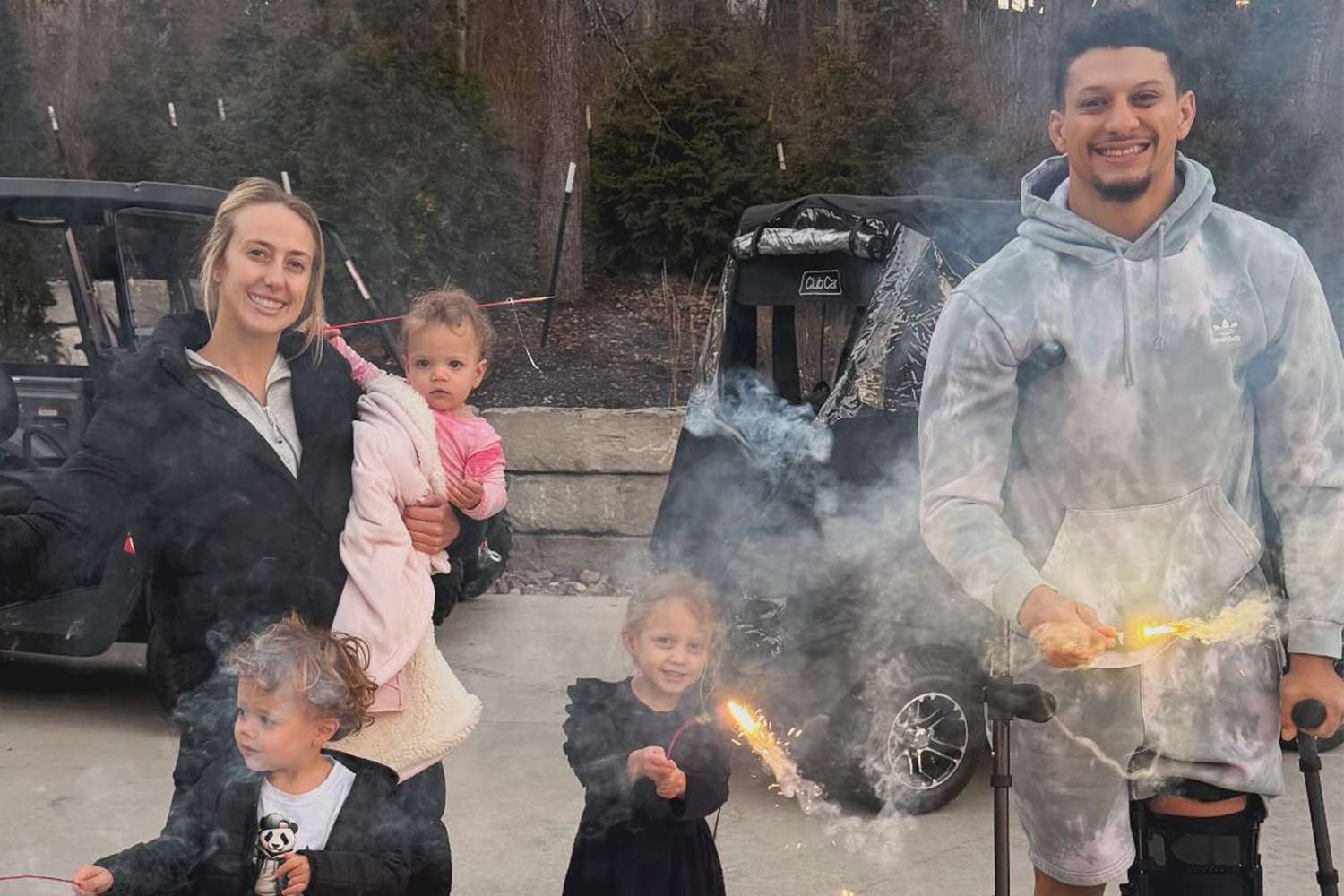Patrick Mahomes lights sparklers with Brittany and kids as he ...