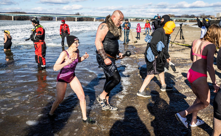 New Year’s Day penguin plunge on City Island: photos