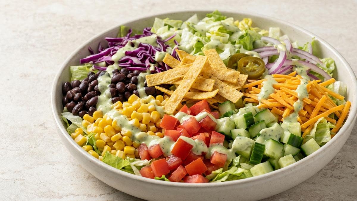 Vegan taco salad with creamy avocado dressing