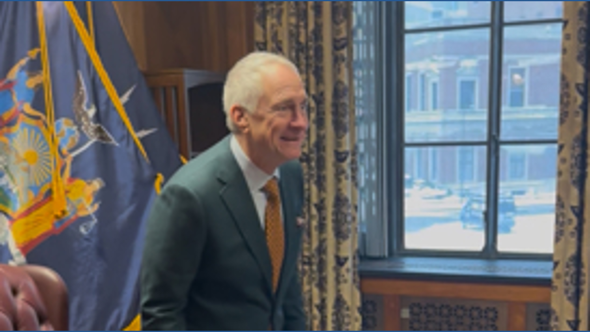 Buffalo Mayor Sean Ryan walks into his office for the first time