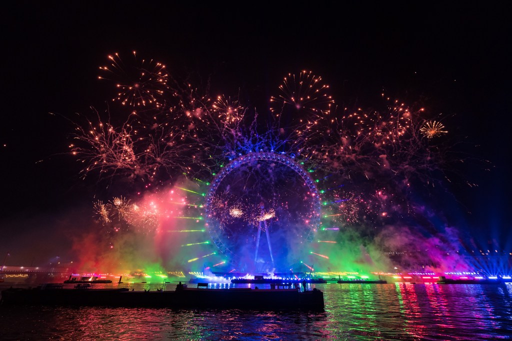 London lights up green and pink in Wicked-themed New Year Eve fireworks