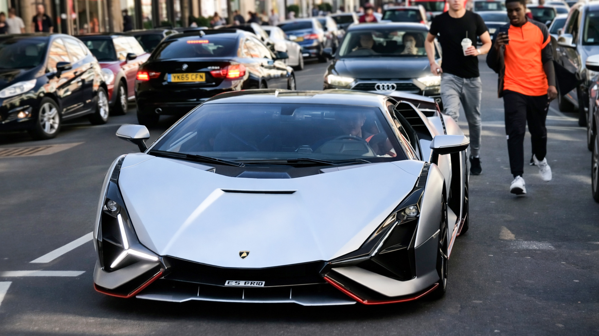 Crowds gather around the $4 million Lamborghini Sian