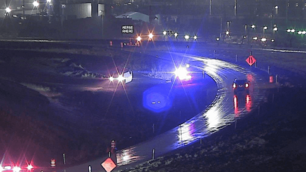 Van rolls off highway onto roof on I-215 on-ramp in Salt Lake