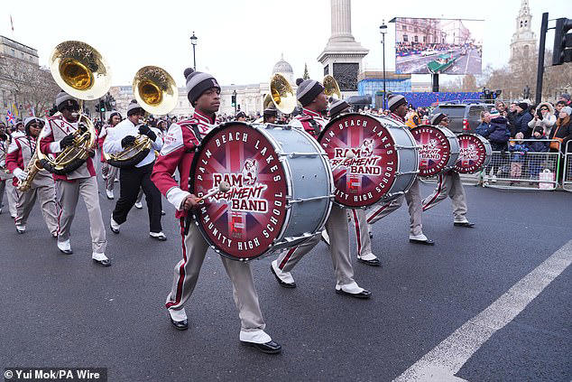 Colourful marching bands, acrobats and floats pack annual New Year's ...