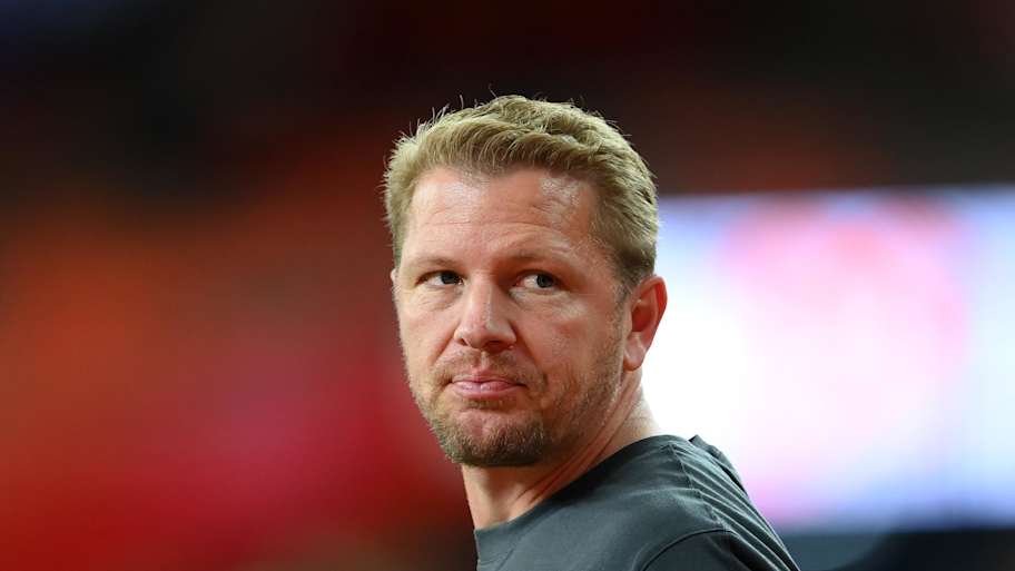 New Michigan coach Kyle Whittingham hires his offensive coordinator