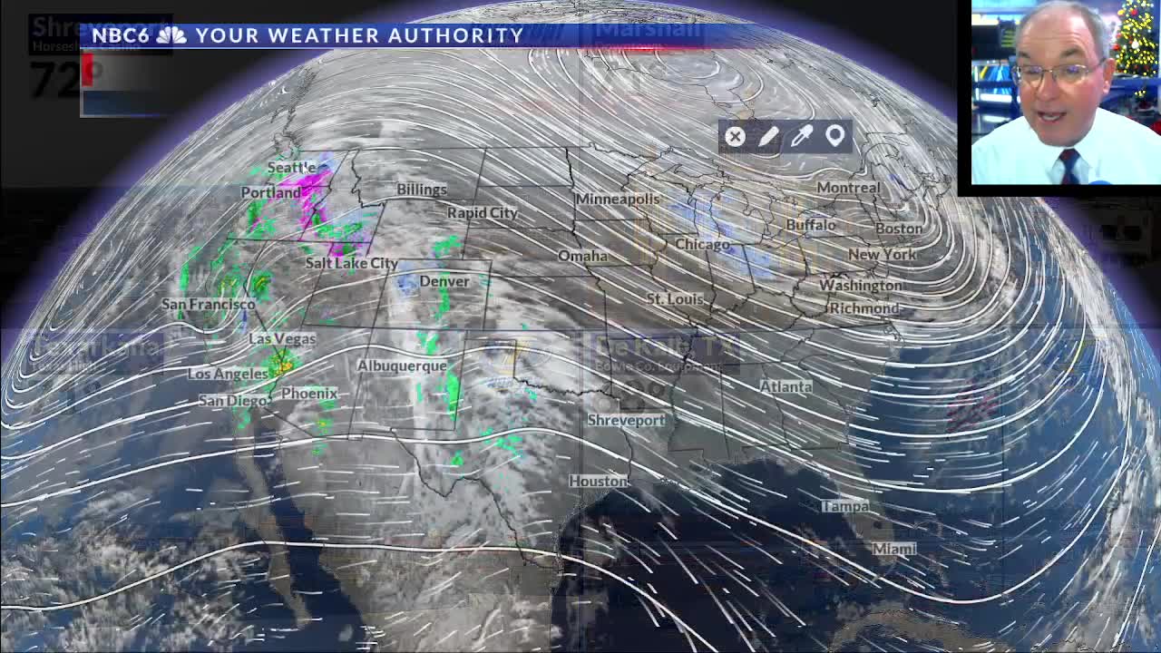 A dry, windy & rather warm Friday!