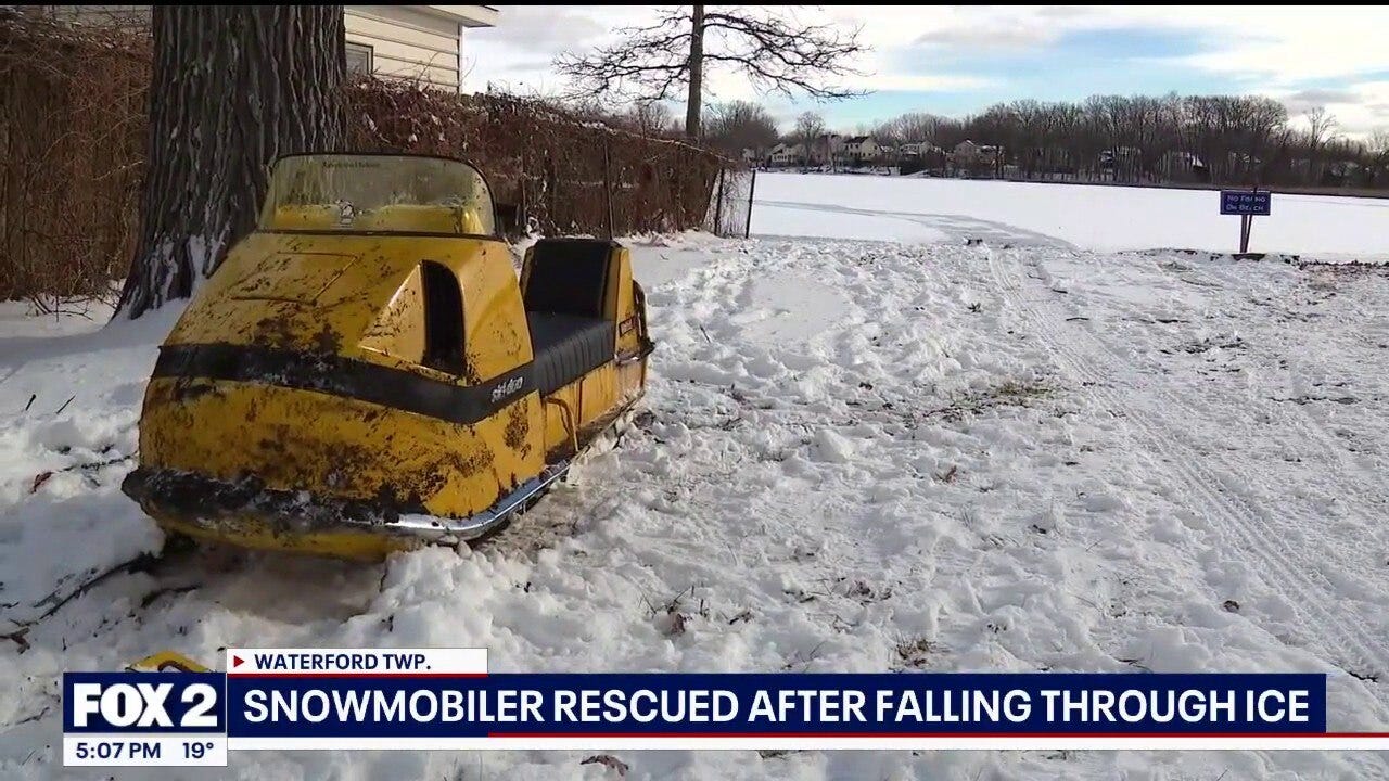 Waterford man rescued after falling through ice on snow mobile