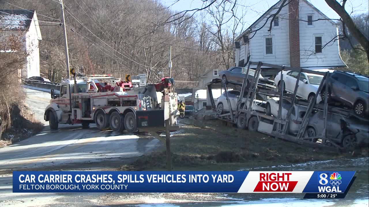 Car carrier crashes in Felton Borough, spills vehicles into yard