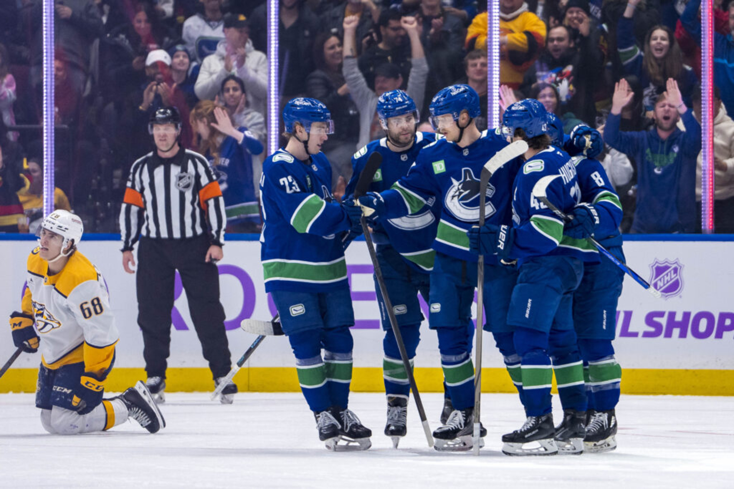 Injury bug strikes again for a couple Vancouver Canucks out for at ...
