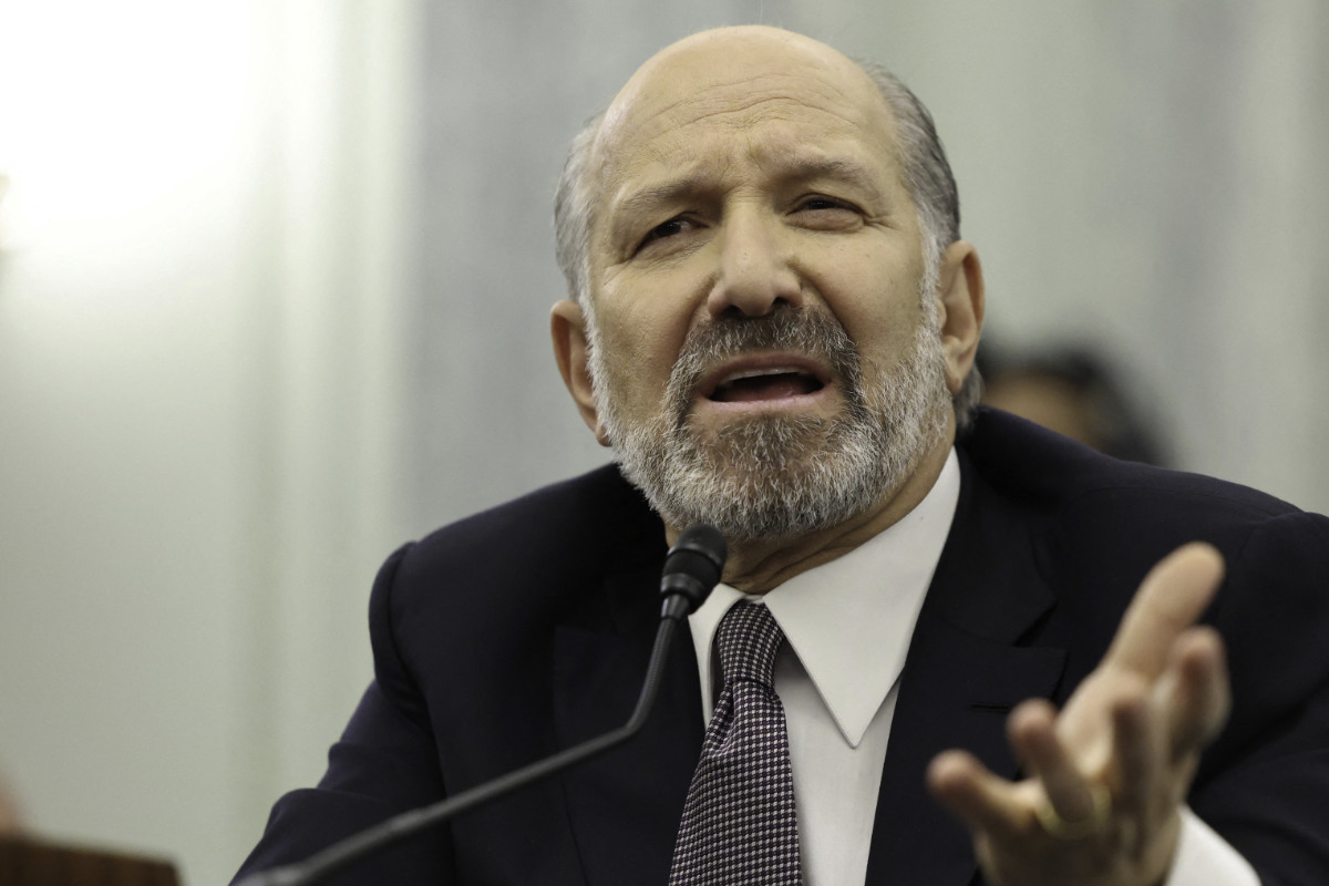 Trump commerce pick backs broad tariffs while taking aim at China in ...