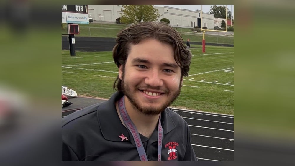 Pep band honors former beloved band director after unexpected passing