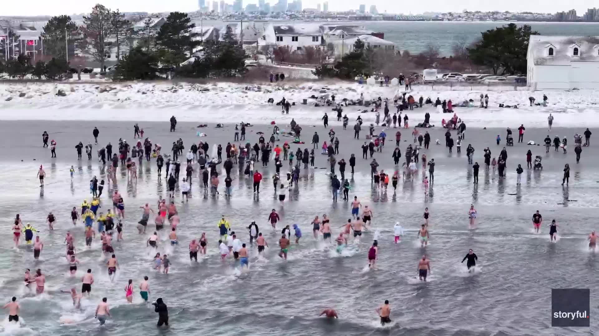 Dozens brave cold for charity ‘polar plunge’ north of Boston
