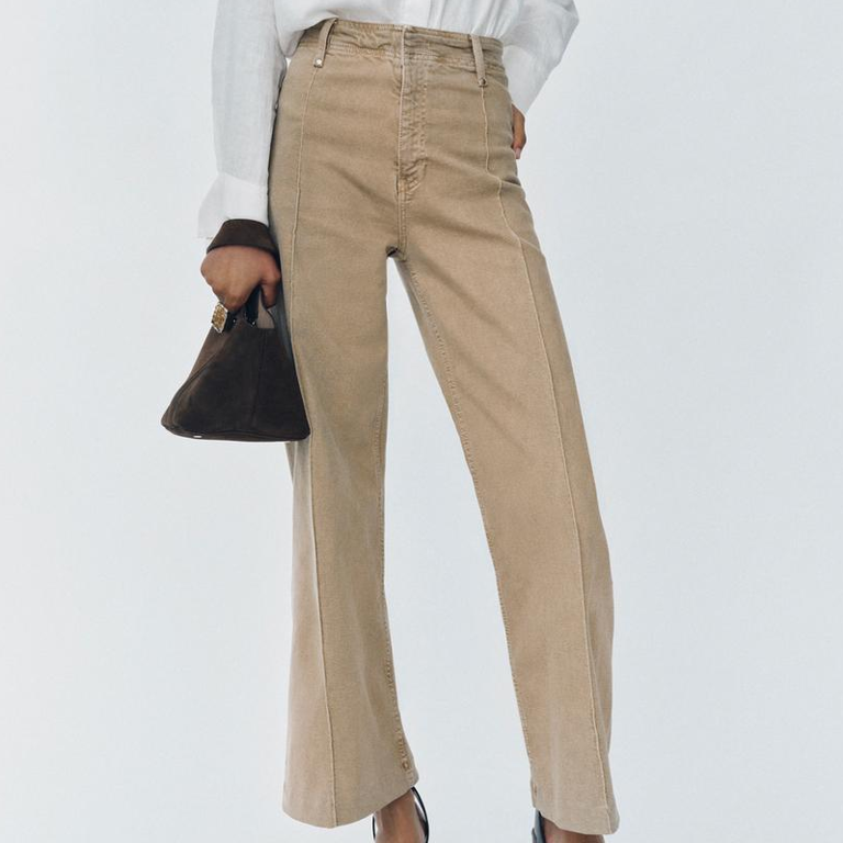 Eva Longoria gives jeans and a jumper a chic coffee-coloured makeover