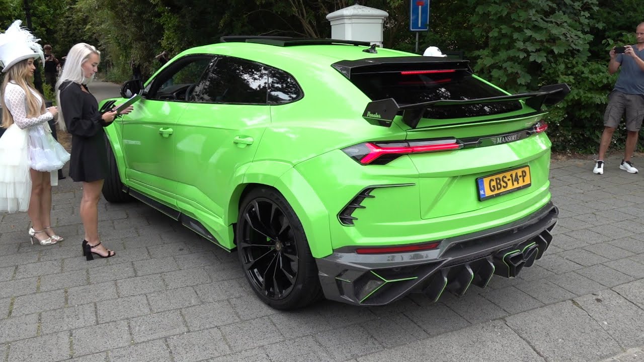 Lamborghini Urus Mansory verde brillante in mostra a un evento su strada