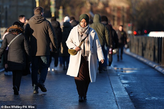 Snow hits Britain as Arctic freeze sends temperatures plummeting to ...
