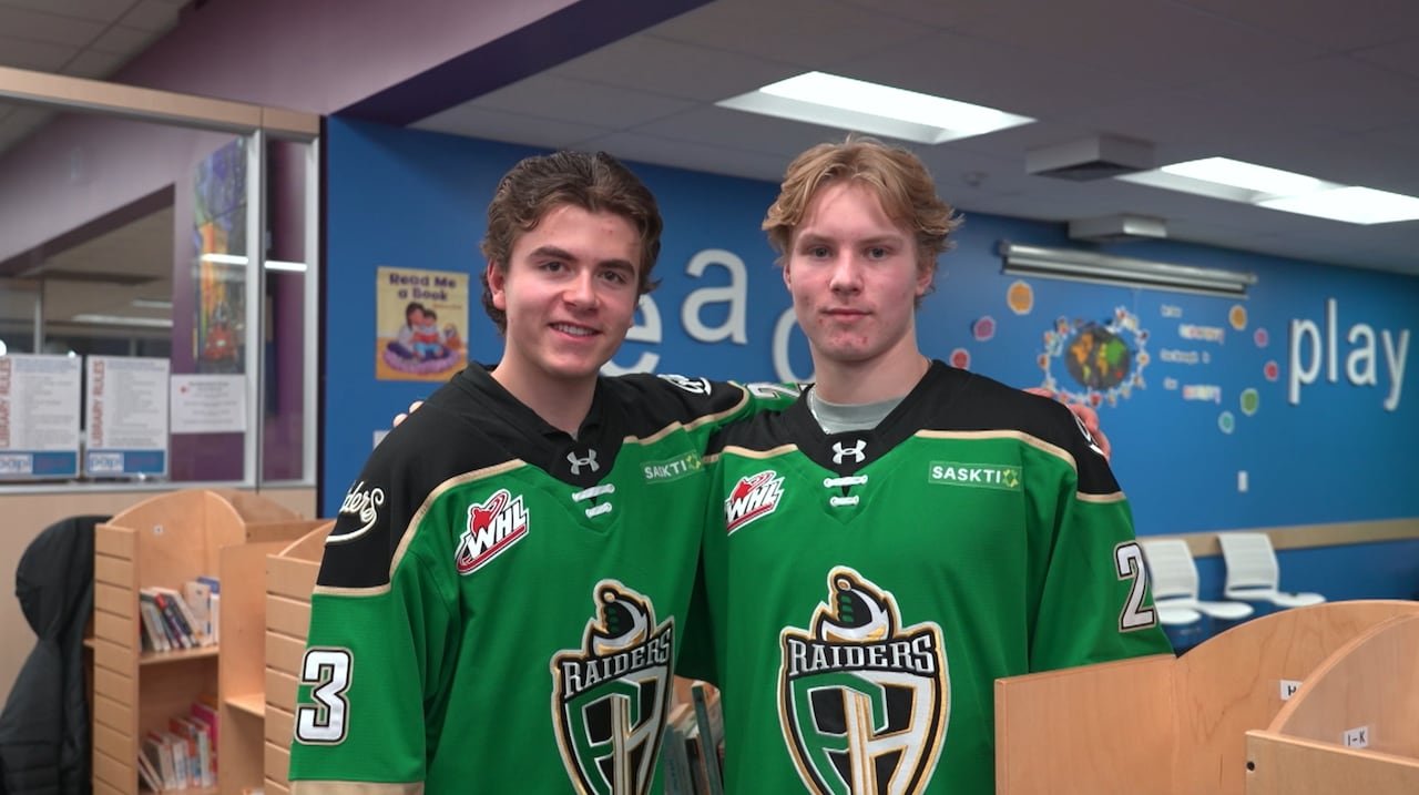 Raiders players swap hockey sticks for storybooks at Prince Albert library