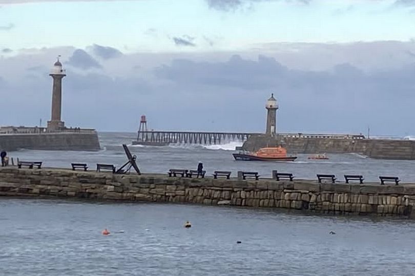 Footage: Beachgoer cut off by tide 80m below Whitby cliff sparks rescue ...