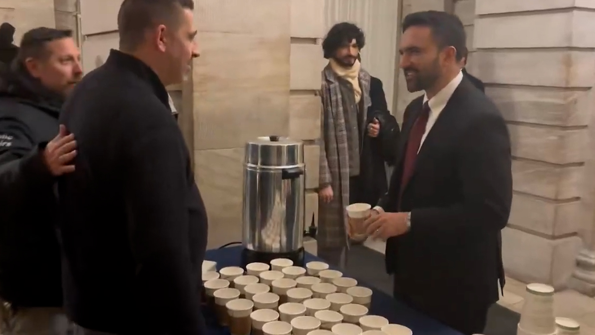 Zohran Mamdani seen giving out hot chocolate after inauguration in NYC