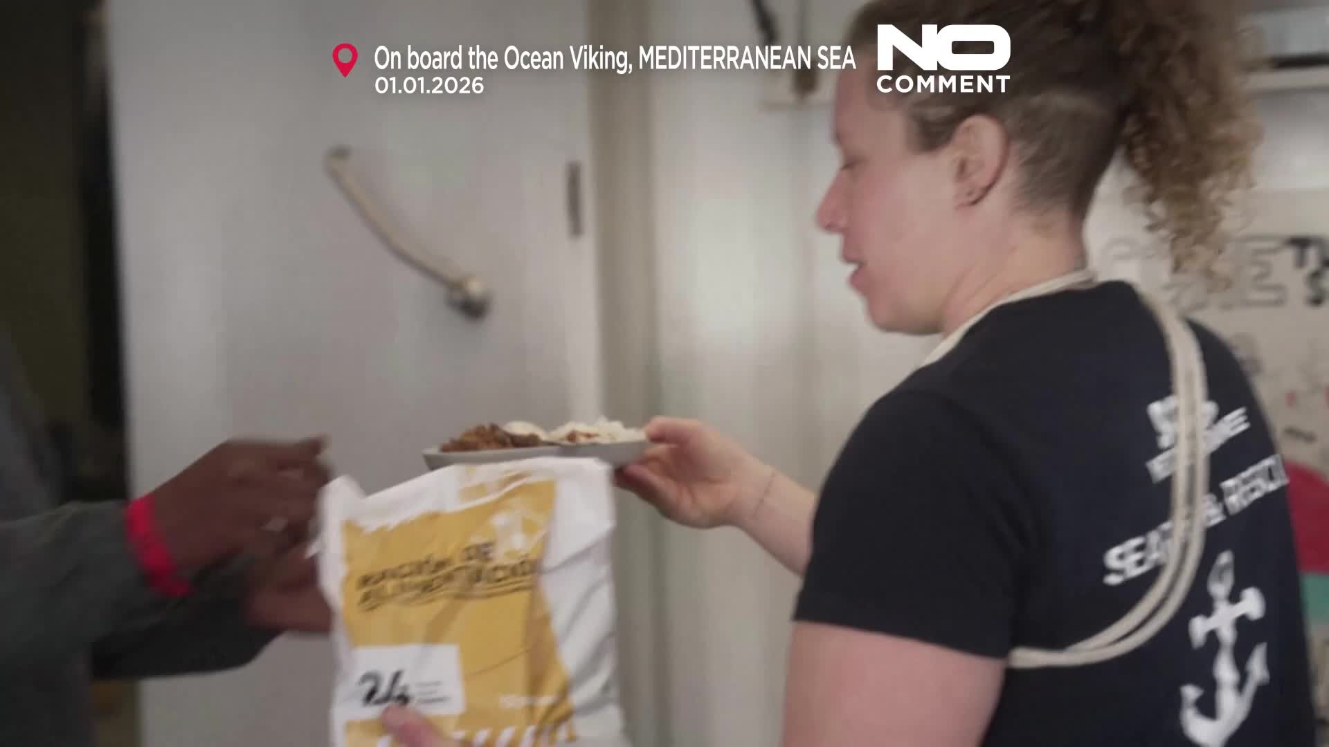 Survivors rescued by SOS Méditerranée mark New Year with hot meal