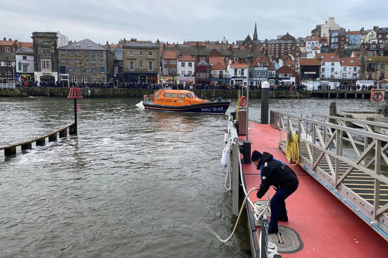 Footage: Beachgoer cut off by tide 80m below Whitby cliff sparks rescue ...