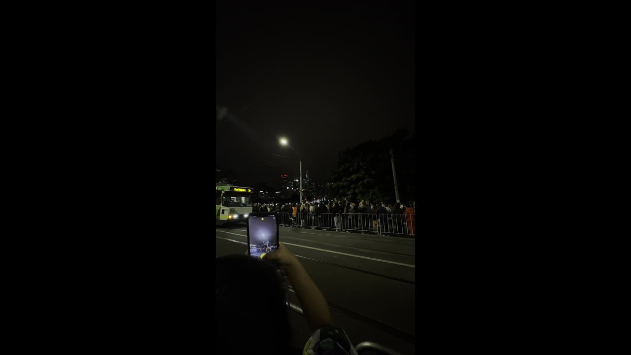 New Year's revellers picture-perfect firework moment ruined by passing bus